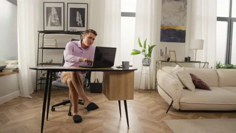 Businessman on zoom meeting from home of... | Stock Video | Pond5