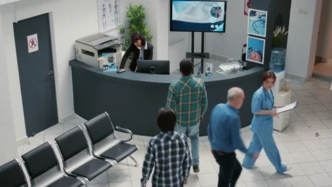 Busy hospital reception and waiting area... | Stock Video | Pond5