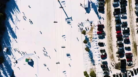 Busy Ski Slope with People Riding Cairli... | Stock Video | Pond5