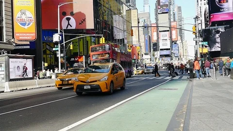 Busy Times Square with cars, and pedestr... | Stock Video | Pond5