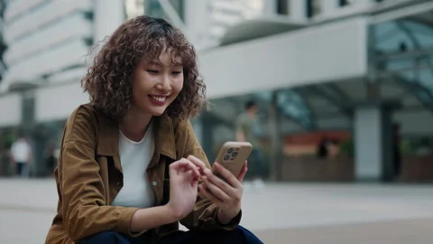 Busy Young Beautiful Girl Sitting On The... | Stock Video | Pond5