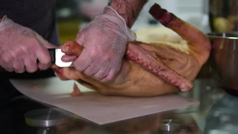 butcher a goose process of cutting up a ... | Stock Video | Pond5