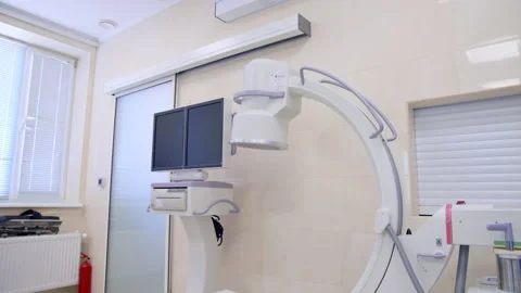C-Arm fluoroscopy machine standing in th... | Stock Video | Pond5