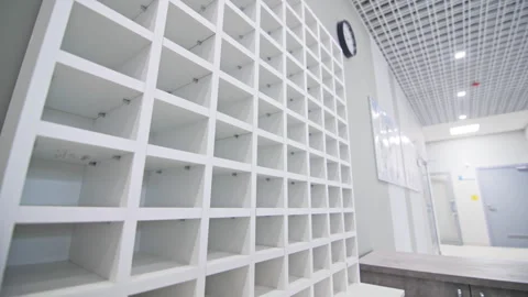 Cabinet with cell rack behind reception ... | Stock Video | Pond5