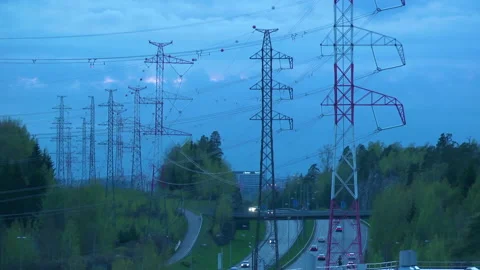Cables of electrical grid over highway. ... | Stock Video | Pond5