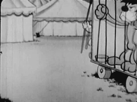 A caged angry lion, and two flexible goo... | Stock Video | Pond5