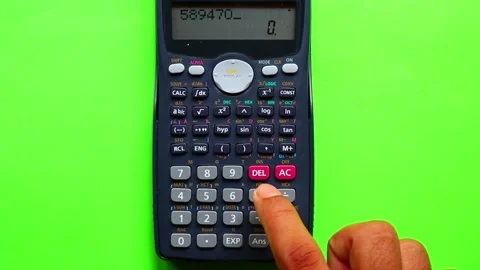 Calculating With a Calculator in Green S... | Stock Video | Pond5