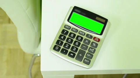 Calculator on the table - green screen | Stock Video | Pond5