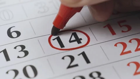 In the calendar, the 14th date is boldly... | Stock Video | Pond5