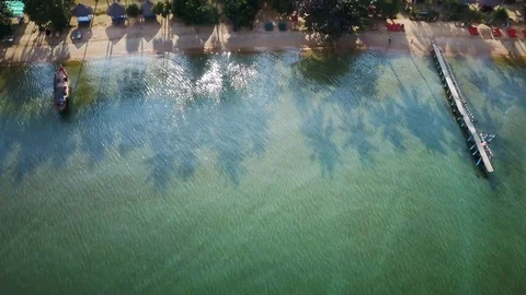 Camera drops down and angles up to show ... | Stock Video | Pond5