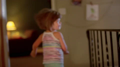 Camera following a cute little girl runn... | Stock Video | Pond5