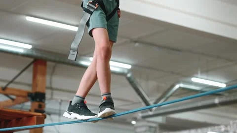 The camera follows the feet of a little ... | Stock Video | Pond5