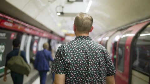 Camera follows man walking through Londo... | Stock Video | Pond5