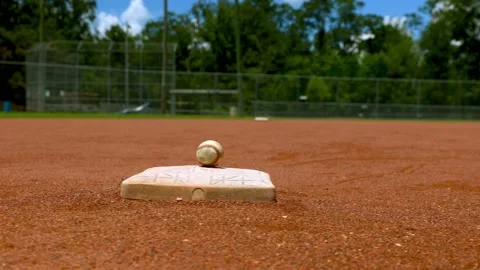 Camera moves across baseball base with b... | Stock Video | Pond5