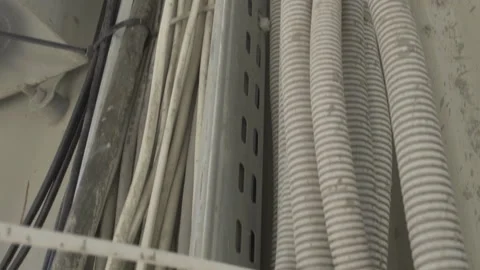 Camera moves up along electrical cable l... | Stock Video | Pond5