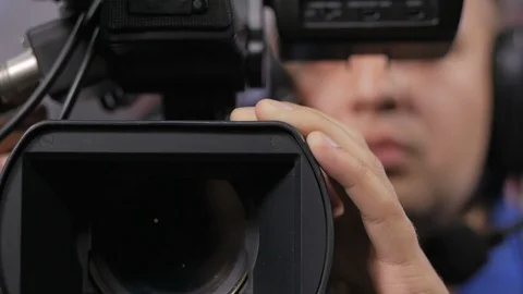 Camera operator working with a cinema br... | Stock Video | Pond5