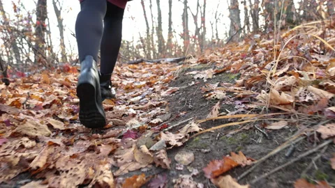 The camera pans behind the legs of a gir... | Stock Video | Pond5