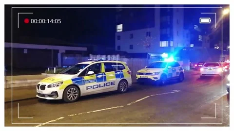 Camera recording two police cars at nigh... | Stock Video | Pond5