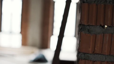 Camera shows wall with red bricks and gr... | Stock Video | Pond5