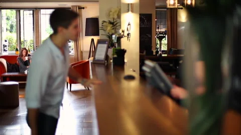 Camera Track Past Hotel Reception Desk W... | Stock Video | Pond5