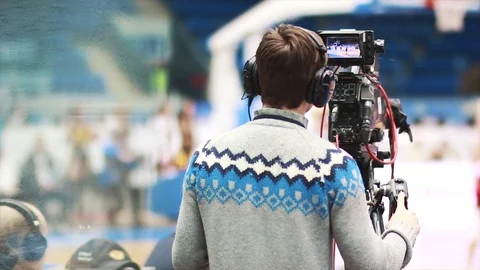 Cameraman filming at live basketball gam... | Stock Video | Pond5