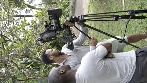 Wildlife Movie Cameraman Stock Footage ~ Royalty Free Stock Videos | Pond5