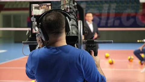 A cameraman uses a camera jib on a telev... | Stock Video | Pond5