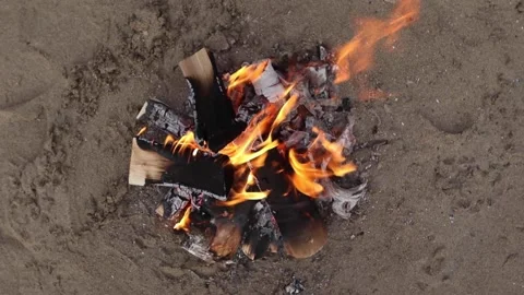 Campfire bonfire on beach. Top down view... | Stock Video | Pond5