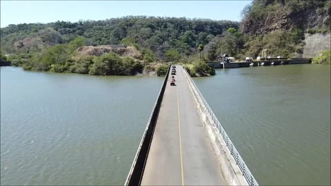 CAN-AM, SIDE-BY-SIDE over bridge, UTV Of... | Stock Video | Pond5