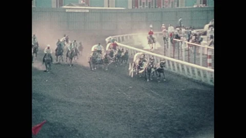 Canada 1970s:Horses race on tracks pulli... | Stock Video | Pond5