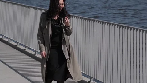 This candid shot captures a woman in mid... | Stock Video | Pond5