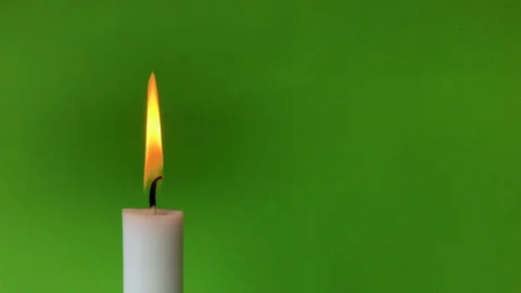 Candle burning in left side of the image... | Stock Video | Pond5