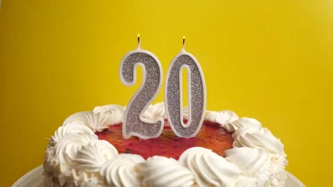 A candle in the form of the number 20, i... | Stock Video | Pond5