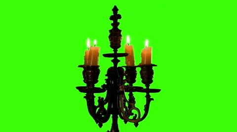 Candle in vintage candlestick on green s... | Stock Video | Pond5