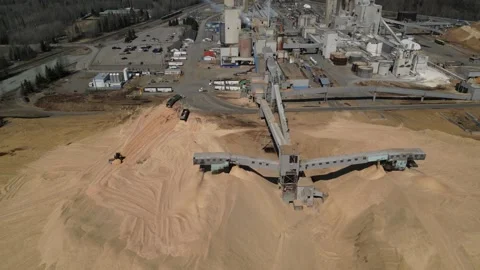 Canfor Northwood Pulp Mill Chip piles an... | Stock Video | Pond5