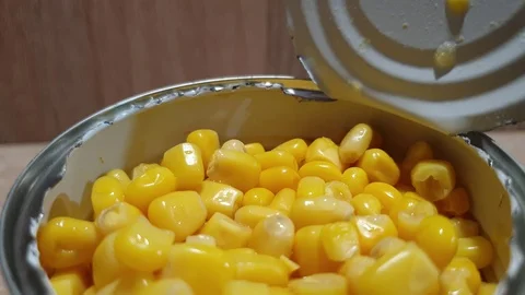 Canned corn in a jar. Can of corn. Corn ... | Stock Video | Pond5