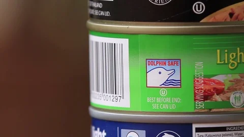 Canned Tuna - Dolphin Friendly logo slow... | Stock Video | Pond5