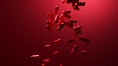 Capsules cascade in 3D on a crimson back... | Stock Video | Pond5