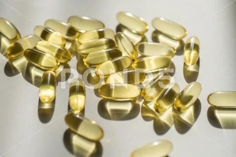 Capsules of fish fat oil vitamin for heart, omega 3, macro Stock Photo ...