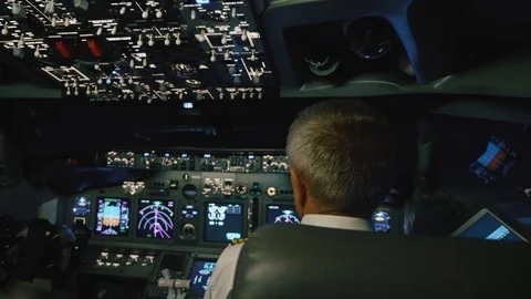 Captain is controls the airplane, rear v... | Stock Video | Pond5