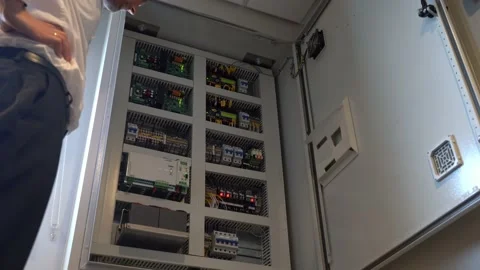 Captain opening electronic control cabin... | Stock Video | Pond5