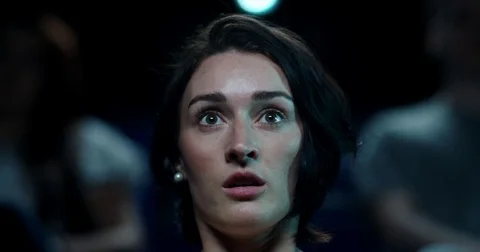 Captivated young woman at the movie thea... | Stock Video | Pond5