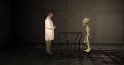 Captured alien being interrogated | Stock Video | Pond5