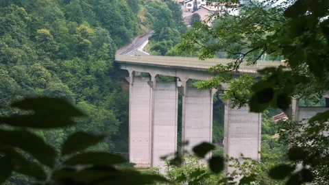 A car bridge between mountains. A park i... | Stock Video | Pond5