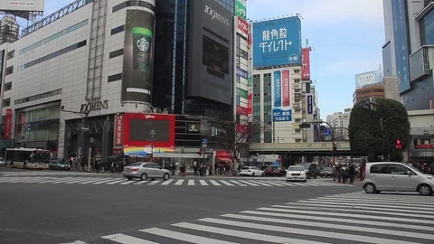 Car comes and goes at Shibuya intersecti... | Stock Video | Pond5