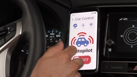 Car Driver Turning Autopilot Function ON | Stock Video | Pond5
