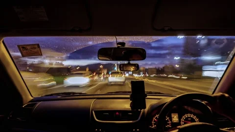 The car driving on busy street road at n... | Stock Video | Pond5