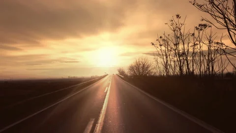 Car driving fast on the countryside asph... | Stock Video | Pond5