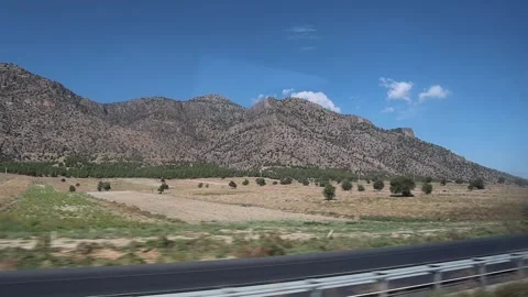 Car driving fast on a summer scenic road... | Stock Video | Pond5