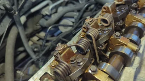 Car engine repair, spring installation. ... | Stock Video | Pond5